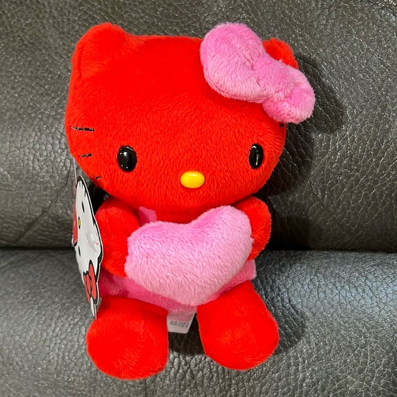 Hello Kitty | Other | Hello Kitty Stuffed Animal In Red Holding Pink ...